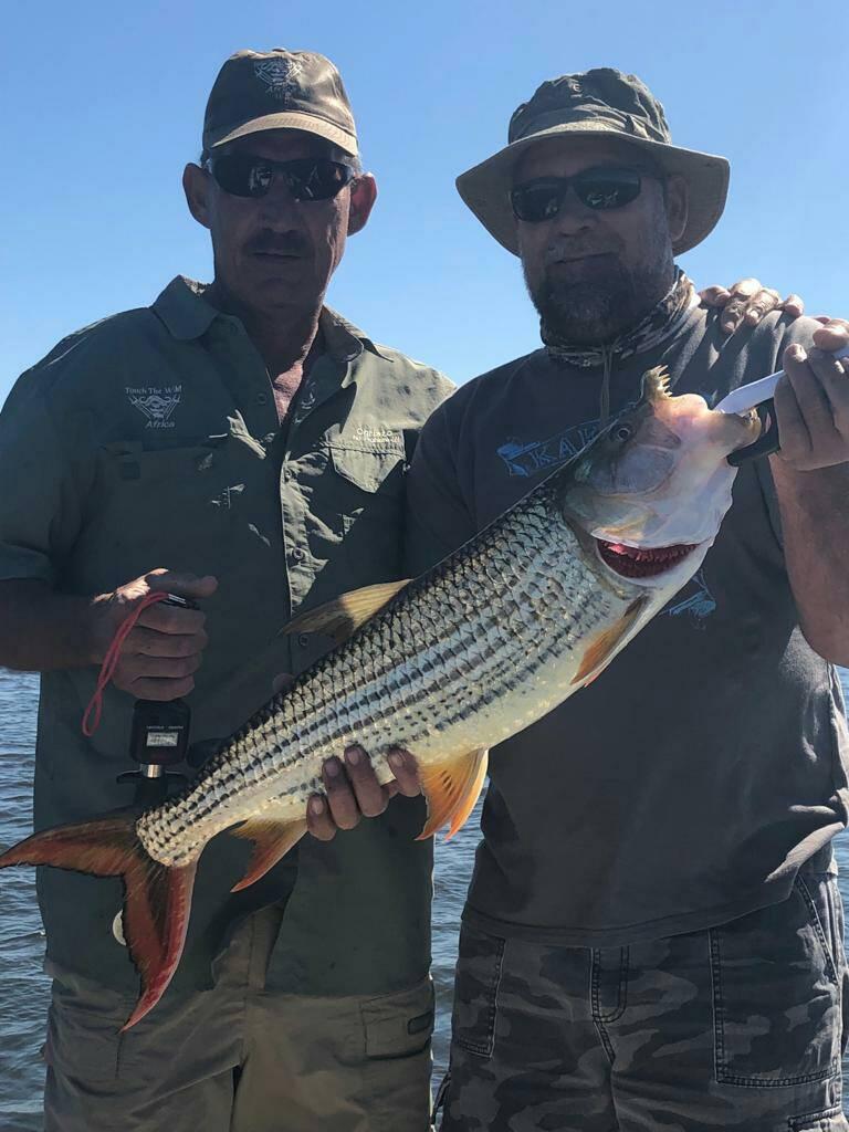 TIGER FISHING – Touch The Wild